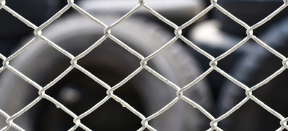 How to Stretch a Wire Mesh Fence | DoItYourself.com