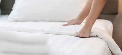 How to Change Bed Sheets on an Occupied Bed | DoItYourself.com