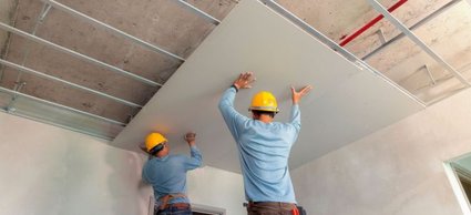 Should You Add Drywall or a Drop Ceiling to a Basement? | DoItYourself.com