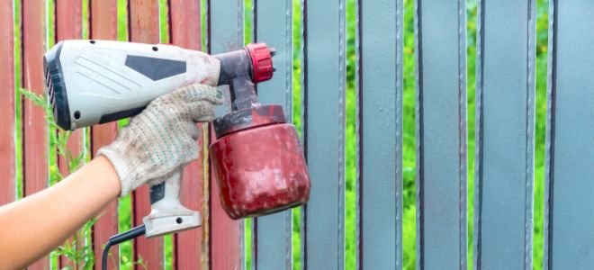 How to Spray Paint a Fence with Old Paint on It | DoItYourself.com