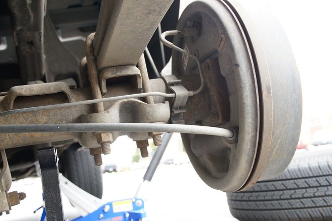 How to Adjust and Align Rear Leaf Springs | DoItYourself.com