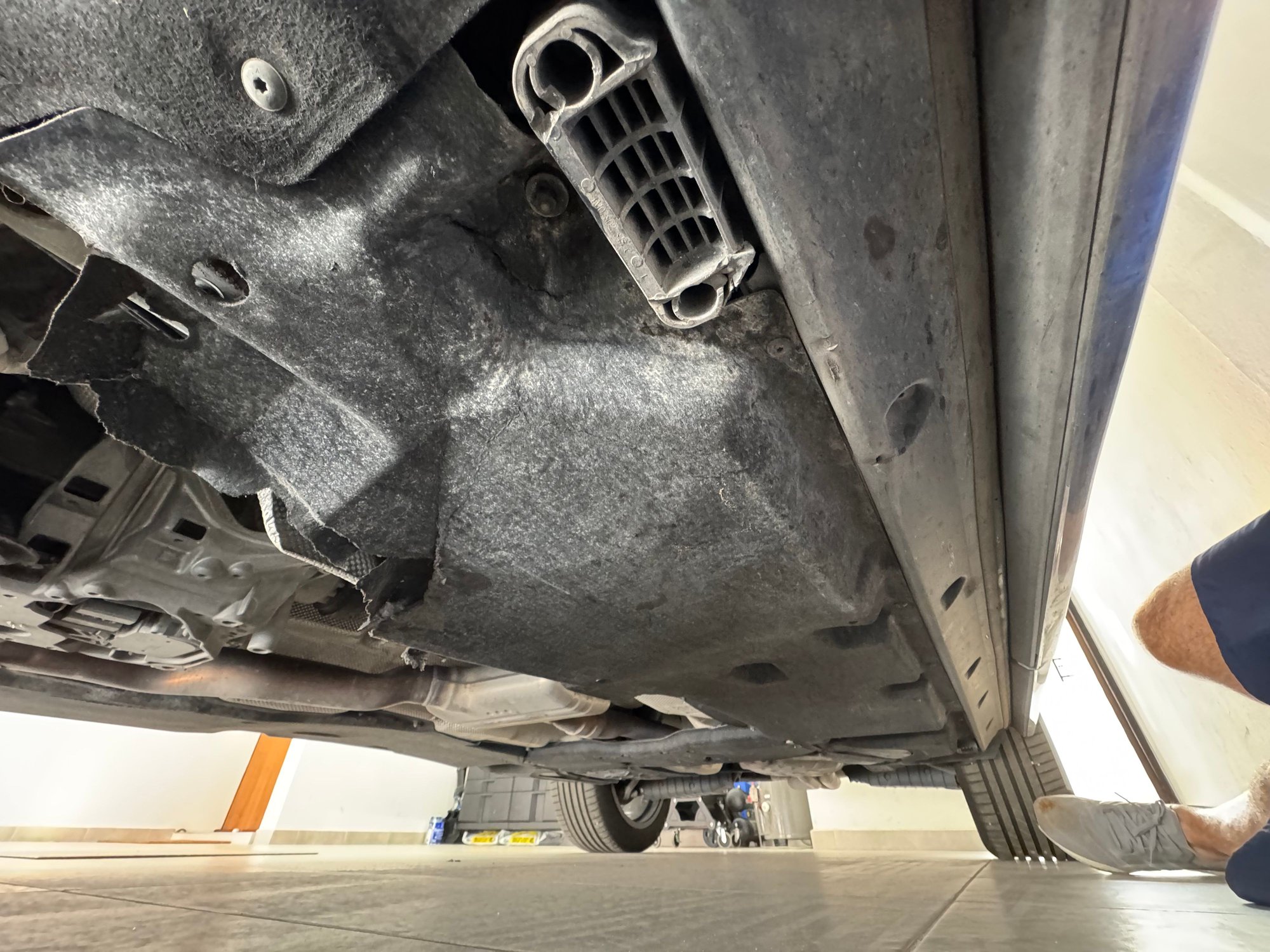 Undercarriage cover damage - AudiWorld Forums