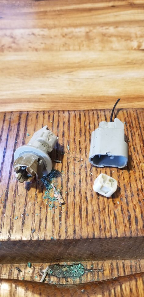 Help! License plate bulb, socket, and writing all corroded - Ford F150 ...