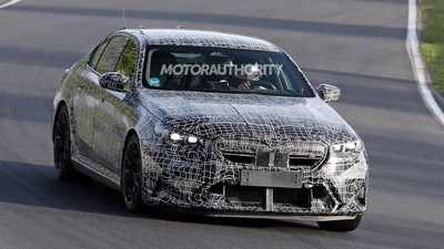 2025 BMW M5 spy shots and video: Hybrid power set for redesigned super ...