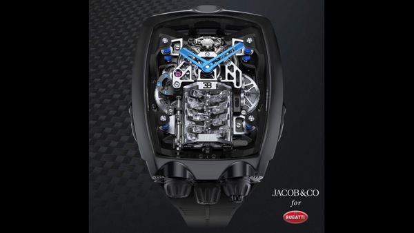 This watch has a working Bugatti W-16 engine inside it